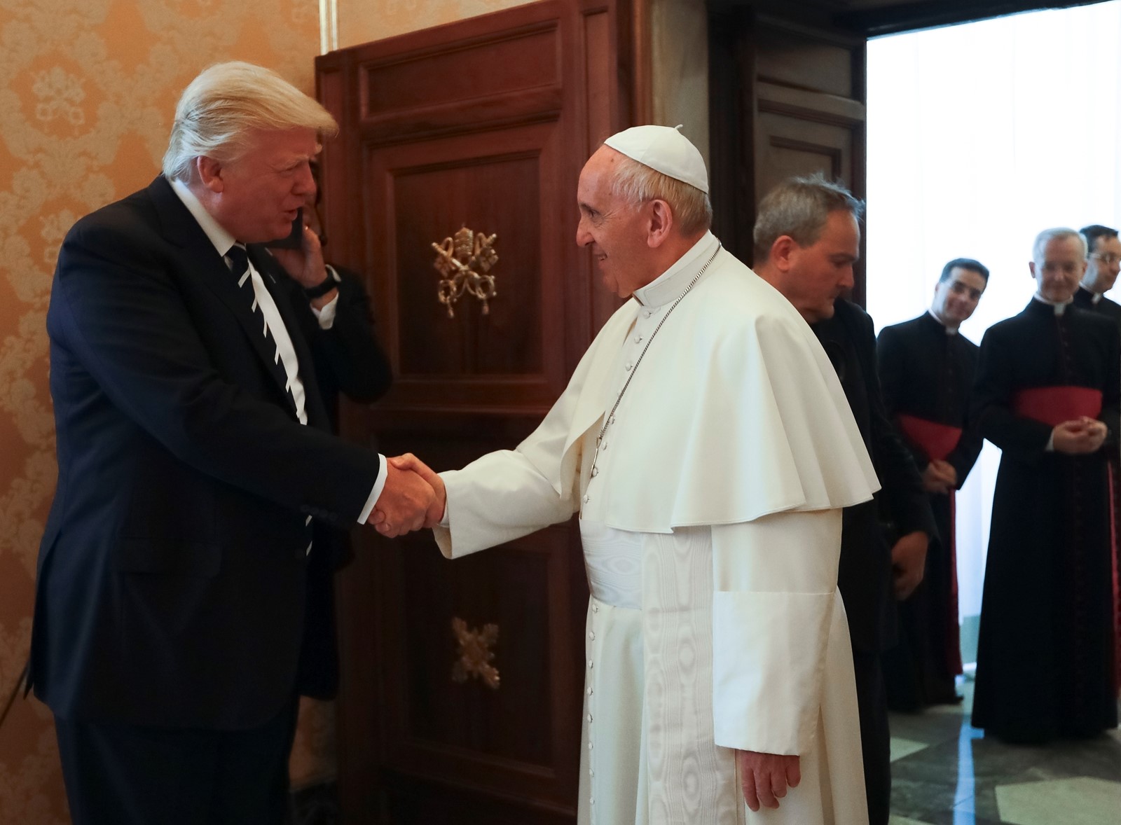 Trump draws criticism with AI image of himself as pope ahead of the ...